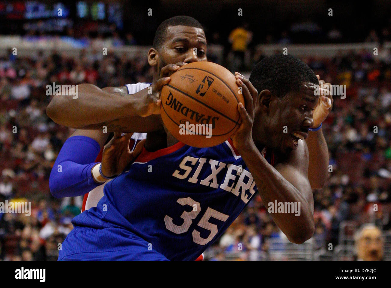 March 29, 2014: Philadelphia 76ers center Henry Sims (35) drives to the ...