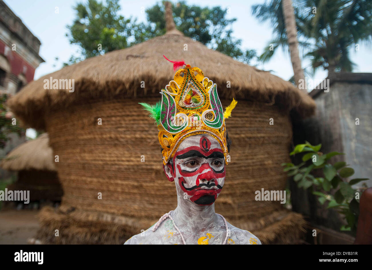 Sona Palashi, India. 12th April, 2014. An Indian Hindu devotee waits to ...