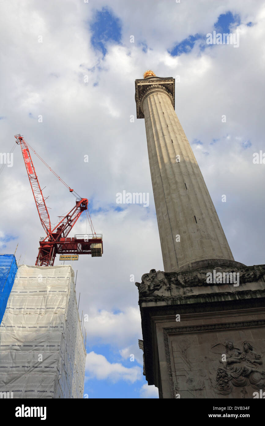 Construction site beside the Monument, City of London, England UK Stock ...