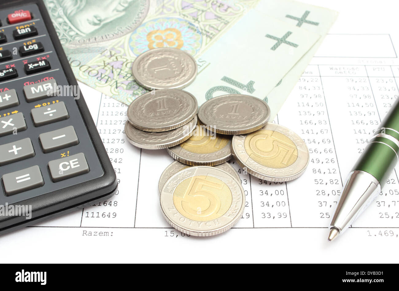 Closeup of heap of coins, paper money, pen and calculator lying on ...