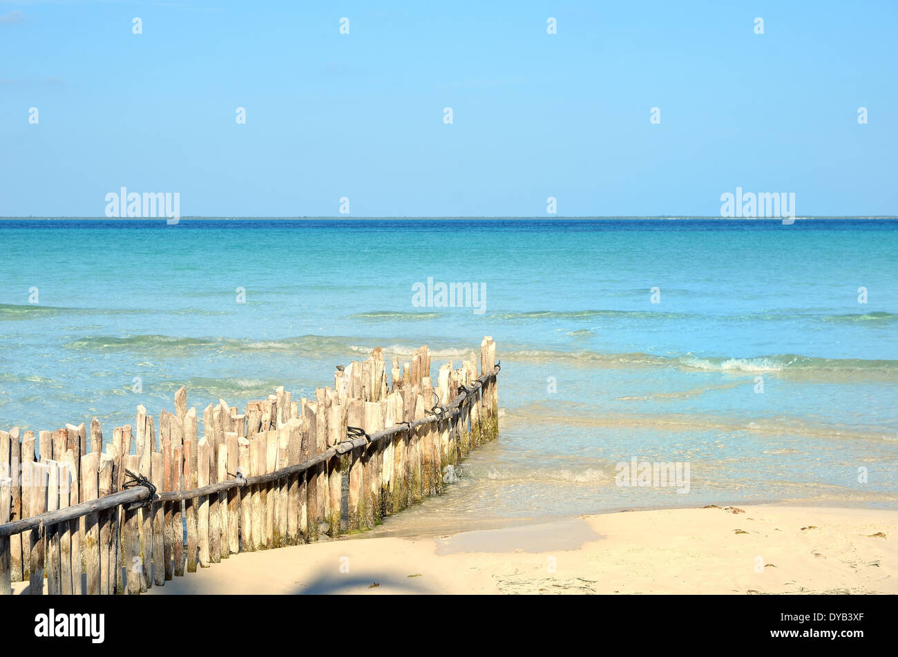 sea and beach with windbreak Stock Photo - Alamy