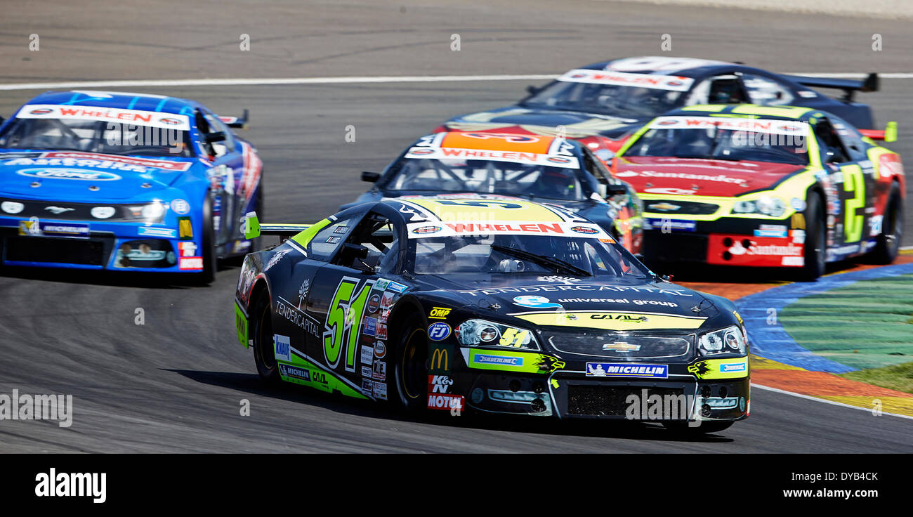 Valencia, Spain. 12th Apr, 2014. Eddie Cheever III of Italy (1st) turns ...