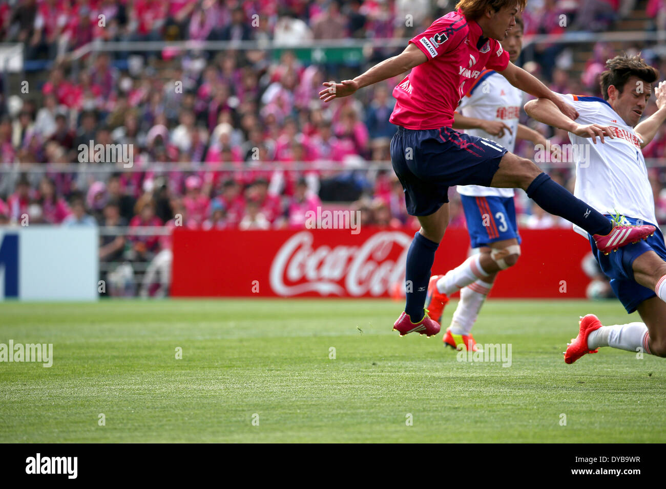 Osaka, Japan. 29th Mar, 2014. Takumi Minamino (Cerezo), Michael James ...