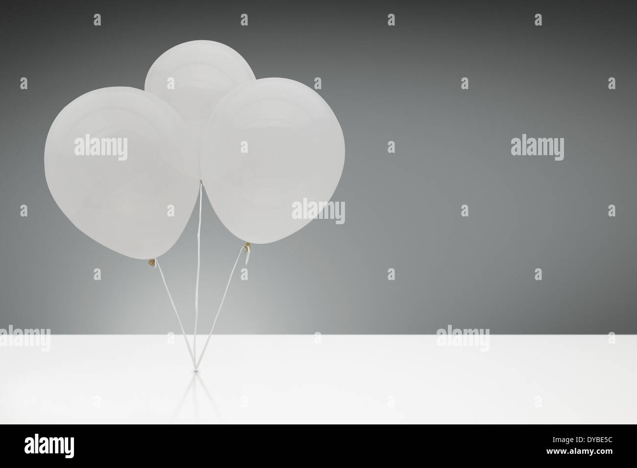 White party balloons Stock Photo - Alamy