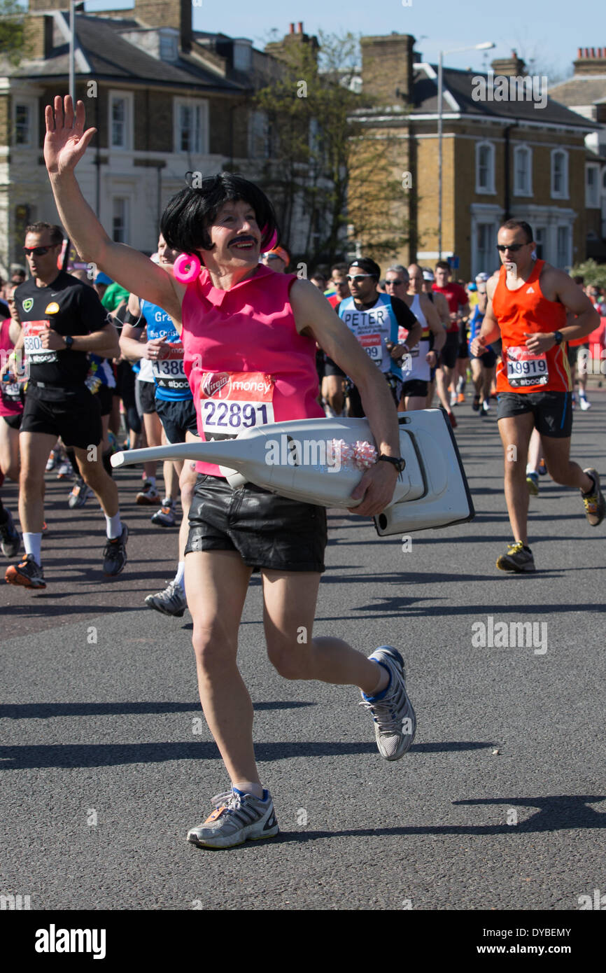 London, UK. 13th Apr, 2014. Runners approach the Sun In the Sands ...