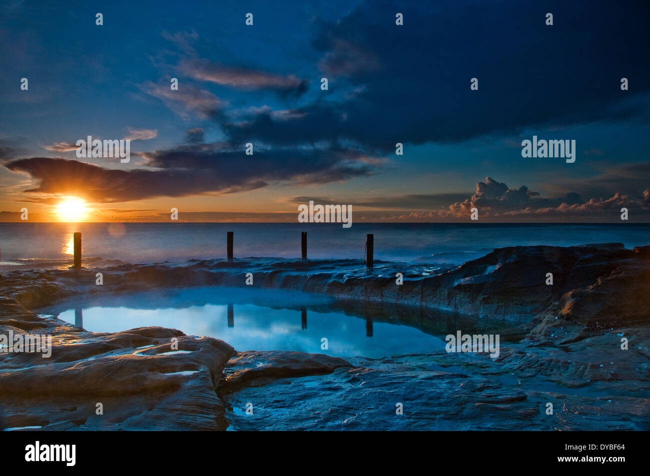 Sunrise over the Ivo Rowe Rockpool, South Coogee, Sydney, Australia ...