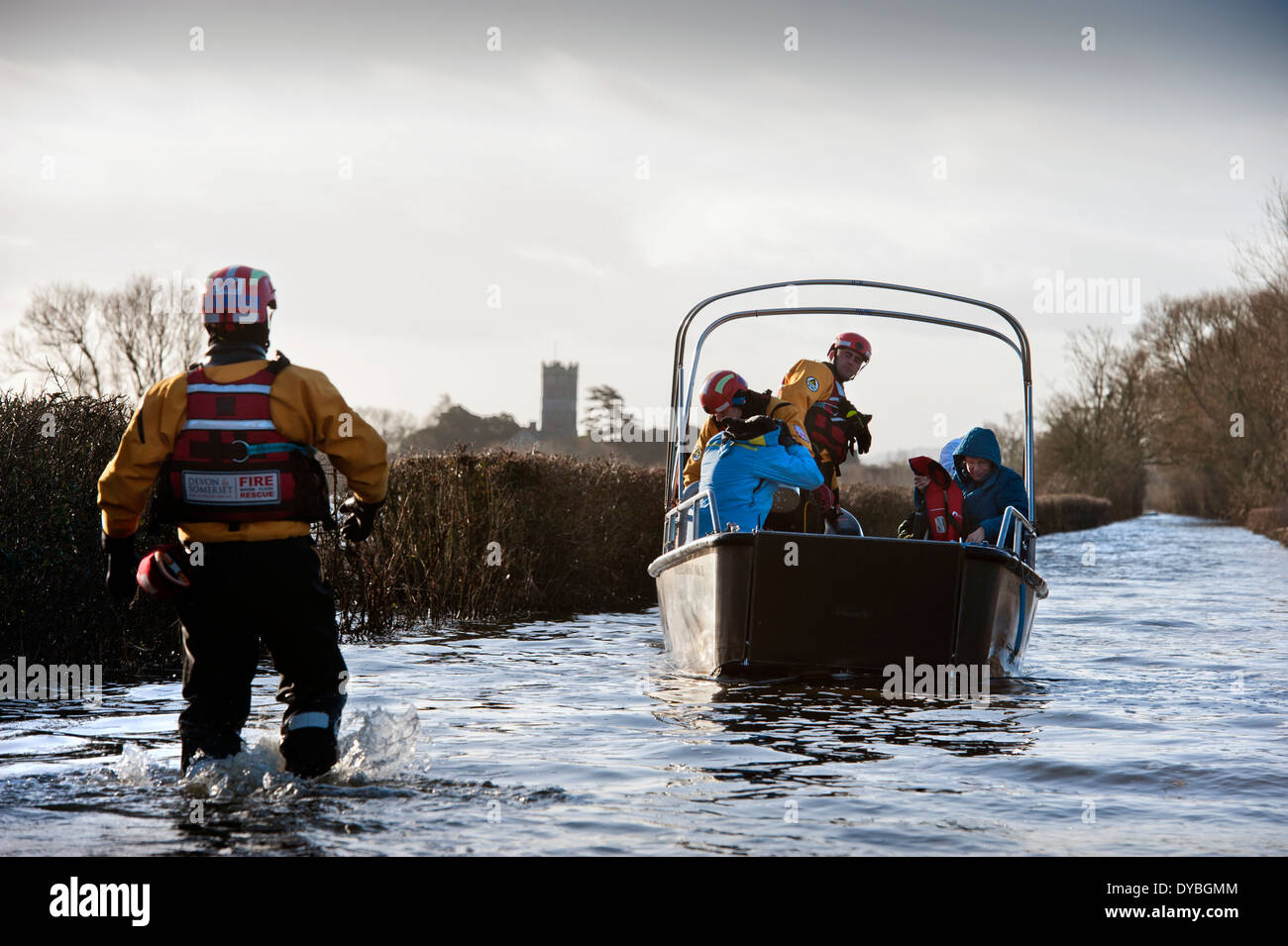 Flooding on the Somerset Levels - a flood rescue team operate a boat ...