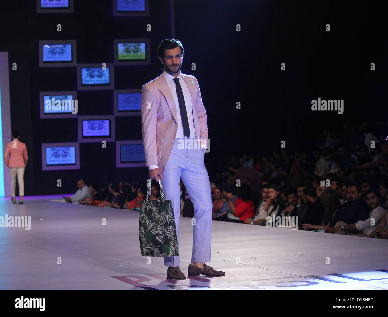 LAHORE, PAKISTAN-APRIL 12 : Pakistani Models present creations by ...