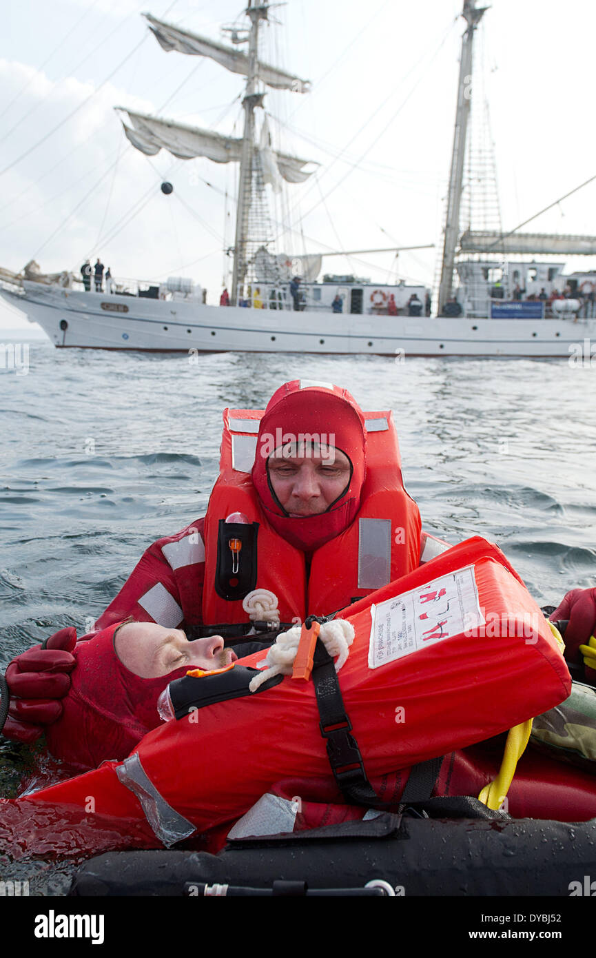 Greifswald, Germany. 12th Apr, 2014. Professor Olaf Schedler (L) is ...