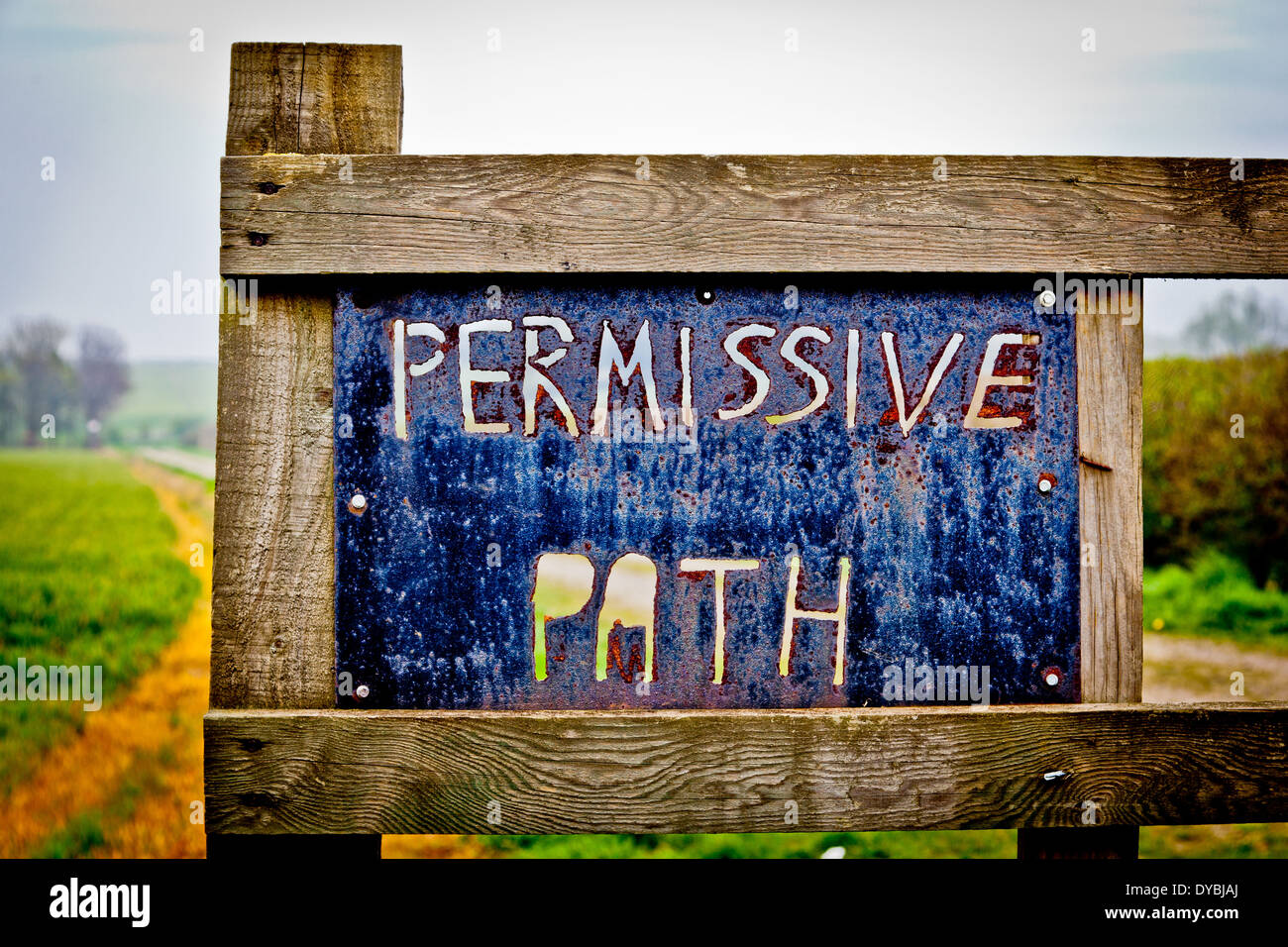A sign showing a permissive path notice to walkers Stock Photo - Alamy