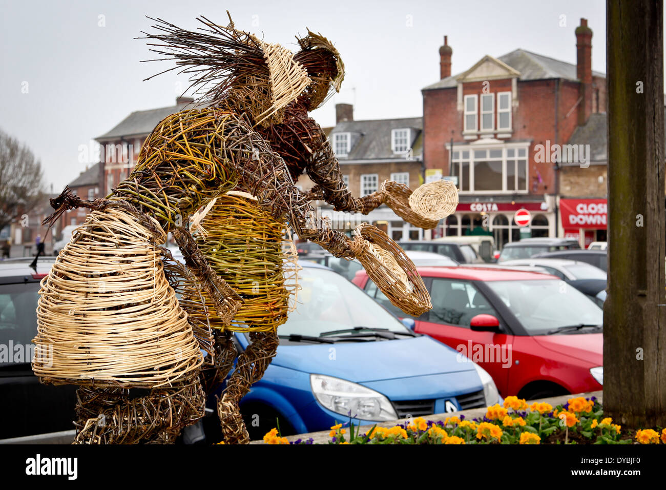 Wicker figures depicting the Olney Pancake Race. Olney in Bucks., is ...