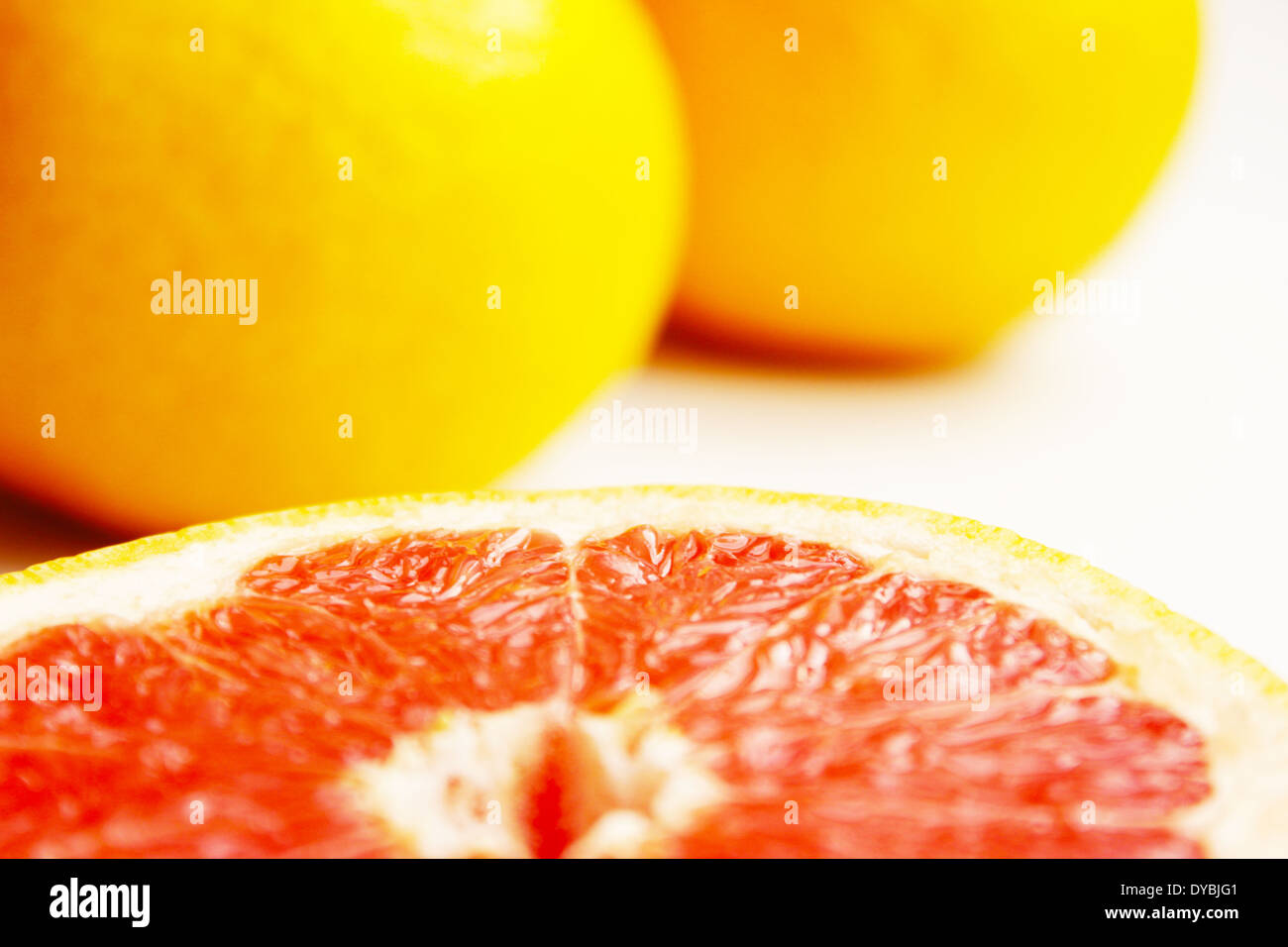 Whole And Cut Pink Grapefruits High Resolution Stock Photography and ...