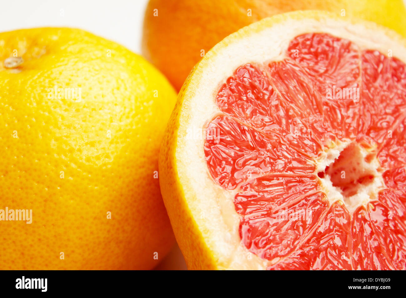 Whole And Cut Pink Grapefruits High Resolution Stock Photography and ...
