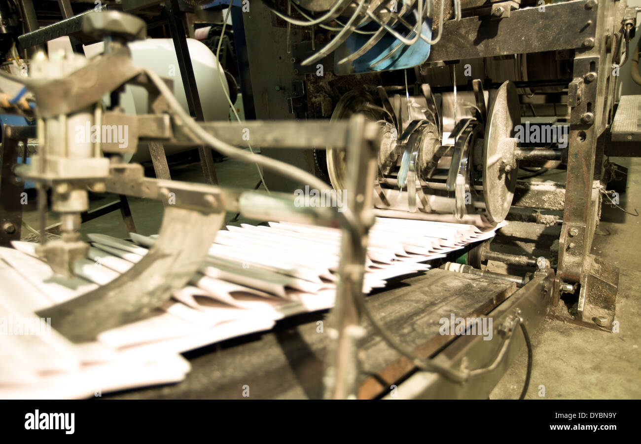 ready newspaper on production line Stock Photo - Alamy