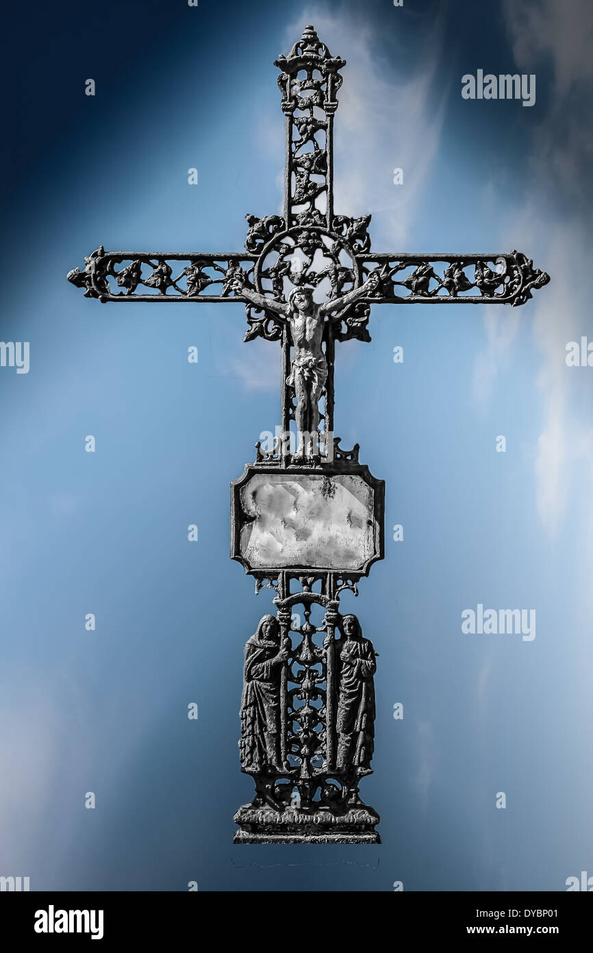Jesus Christ on a wrought iron cross Stock Photo - Alamy