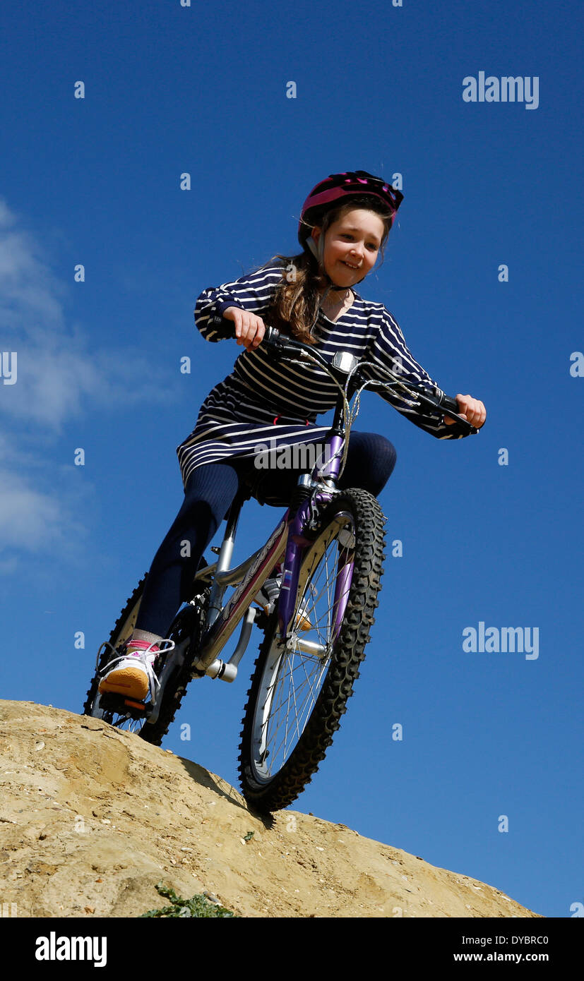 Girl bicycle ground hi-res stock photography and images - Alamy