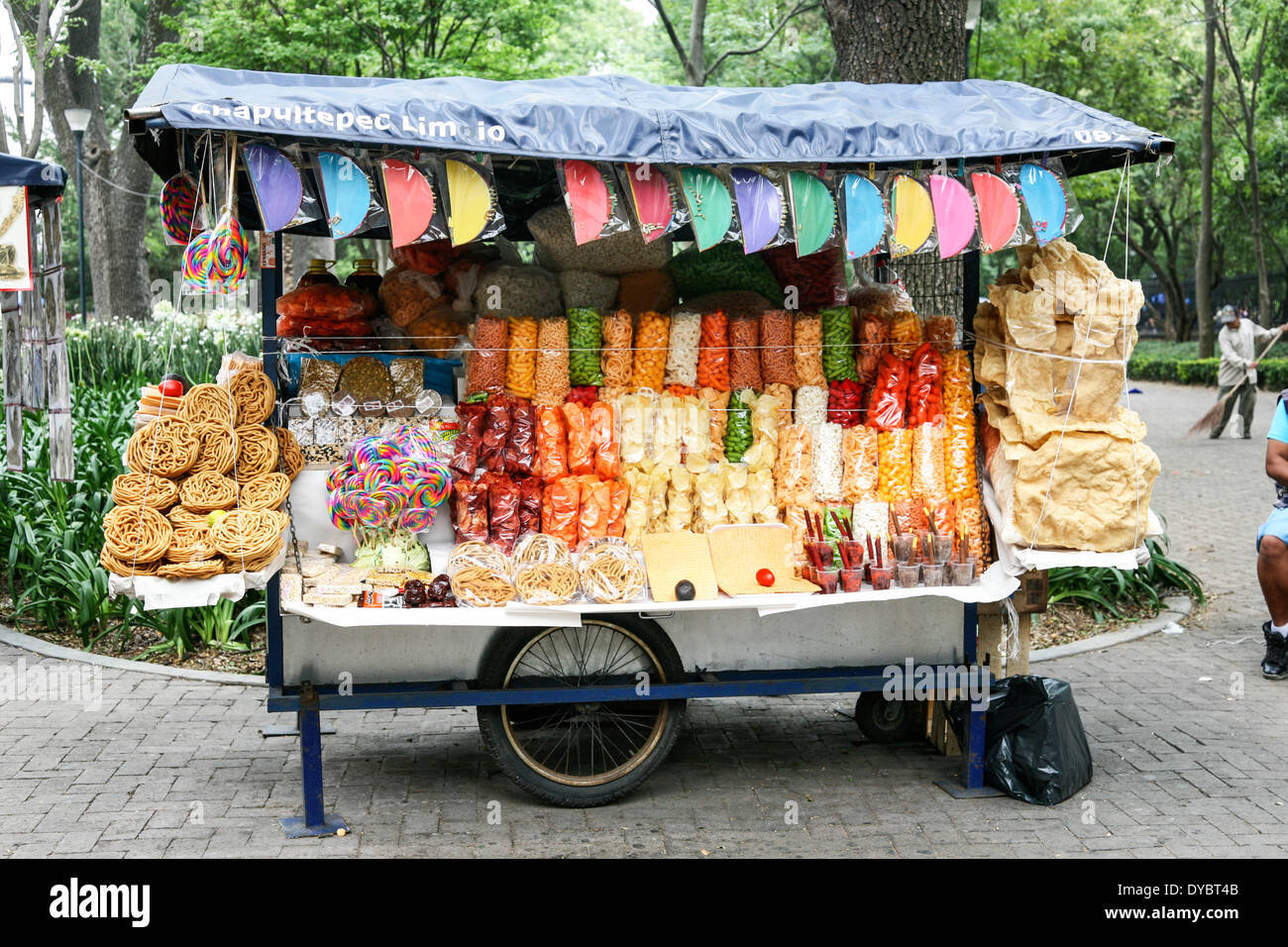 colorful street food cart displays attractively packaged junk food ... colorful street food cart displays attractively packaged junk food ...