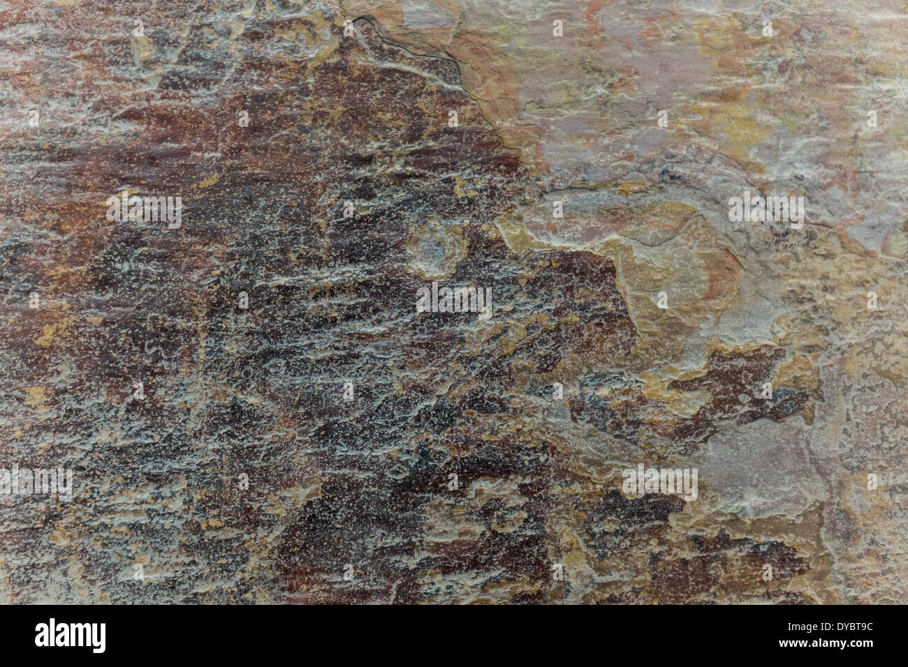 Mudstone slate rock face background texture Stock Photo - Alamy