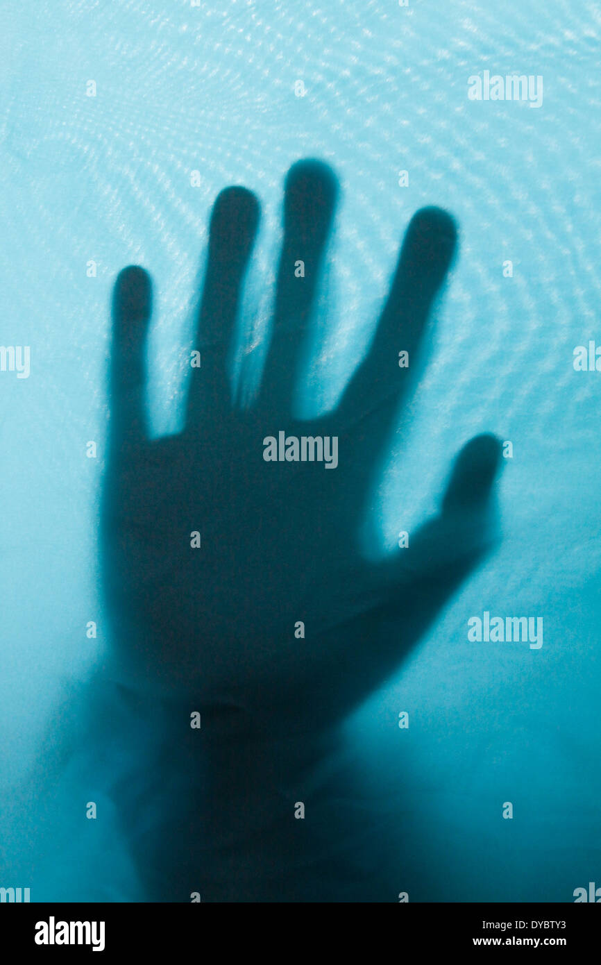 Hand behind fabric hi-res stock photography and images - Alamy