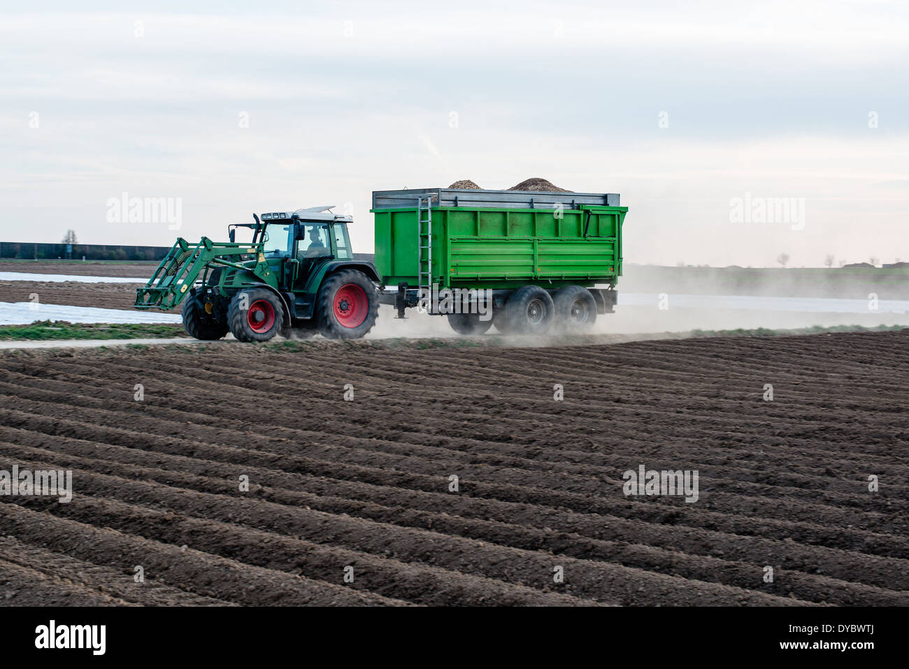 Modern tractor with trailer Stock Photo - Alamy