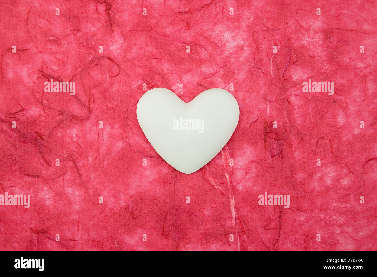 White Heart on hand made craft paper Stock Photo - Alamy