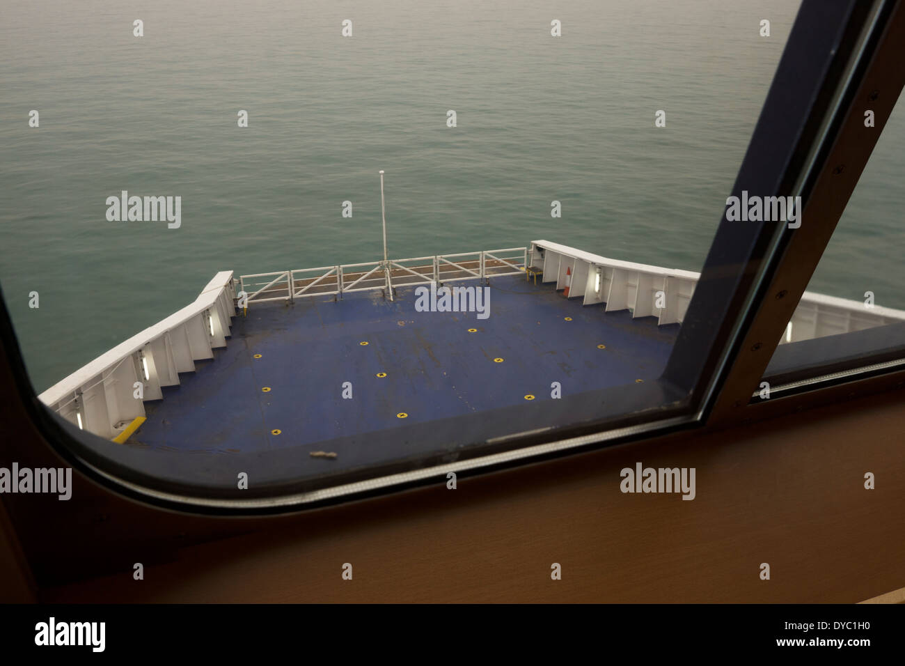 Ferry Front, blue car deck, wooden window plat, smooth oceanic waves ...