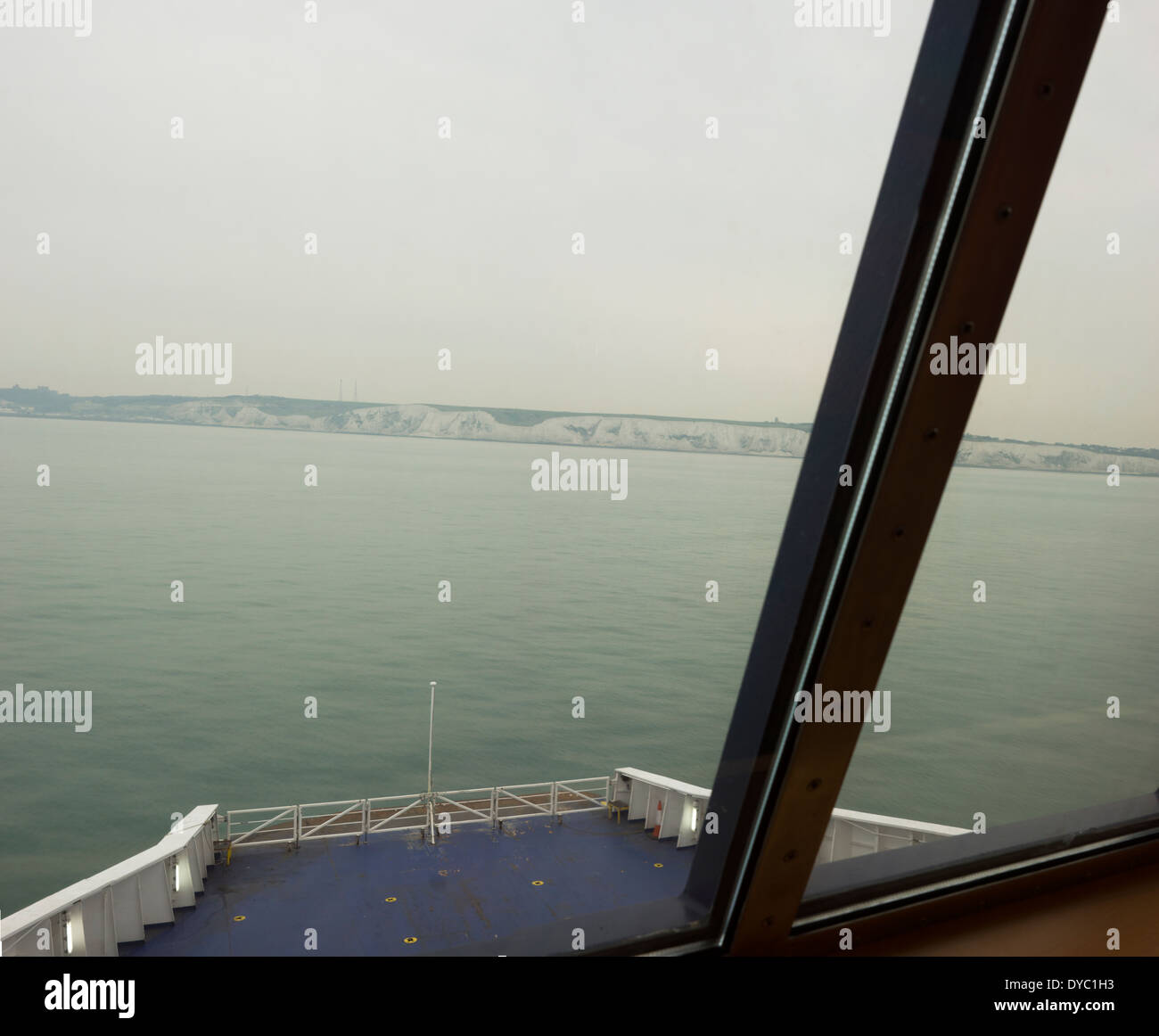 Ferry Front, blue car deck, wooden window plat, smooth oceanic waves ...