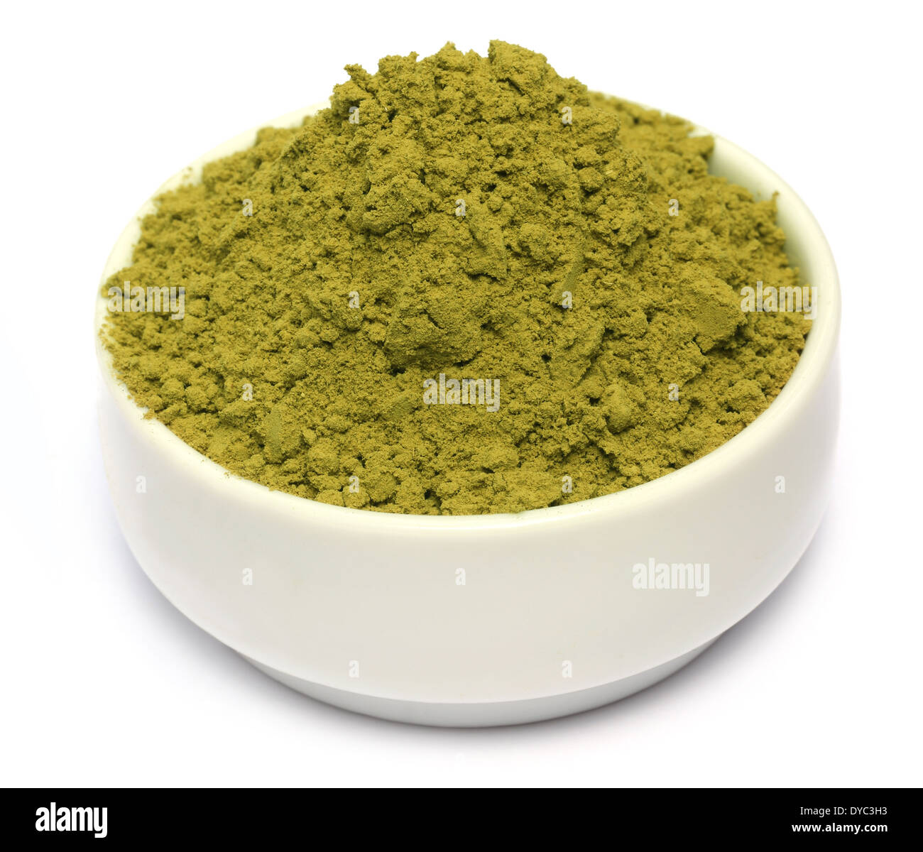 Henna powder on ceramic bowl over white background Stock Photo - Alamy