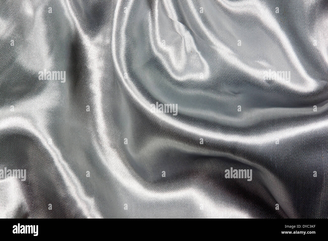 closeup of draped soft silver satin fabric Stock Photo - Alamy