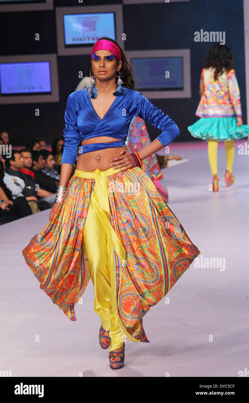 LAHORE, PAKISTAN - APRIL 13 : Pakistani Models present creations by ...