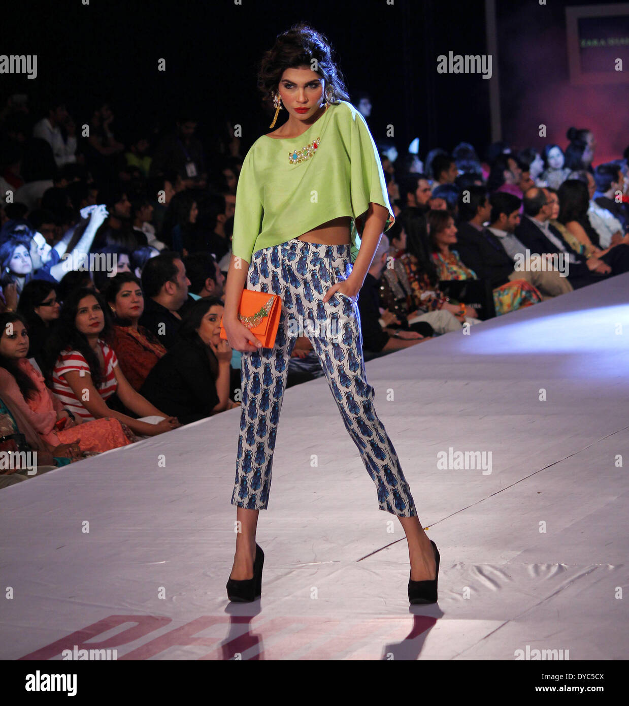 LAHORE, PAKISTAN - APRIL 13 : Pakistani Models present creations by ...