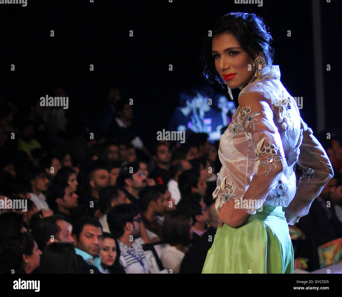 LAHORE, PAKISTAN - APRIL 13 : Pakistani Models present creations by ...