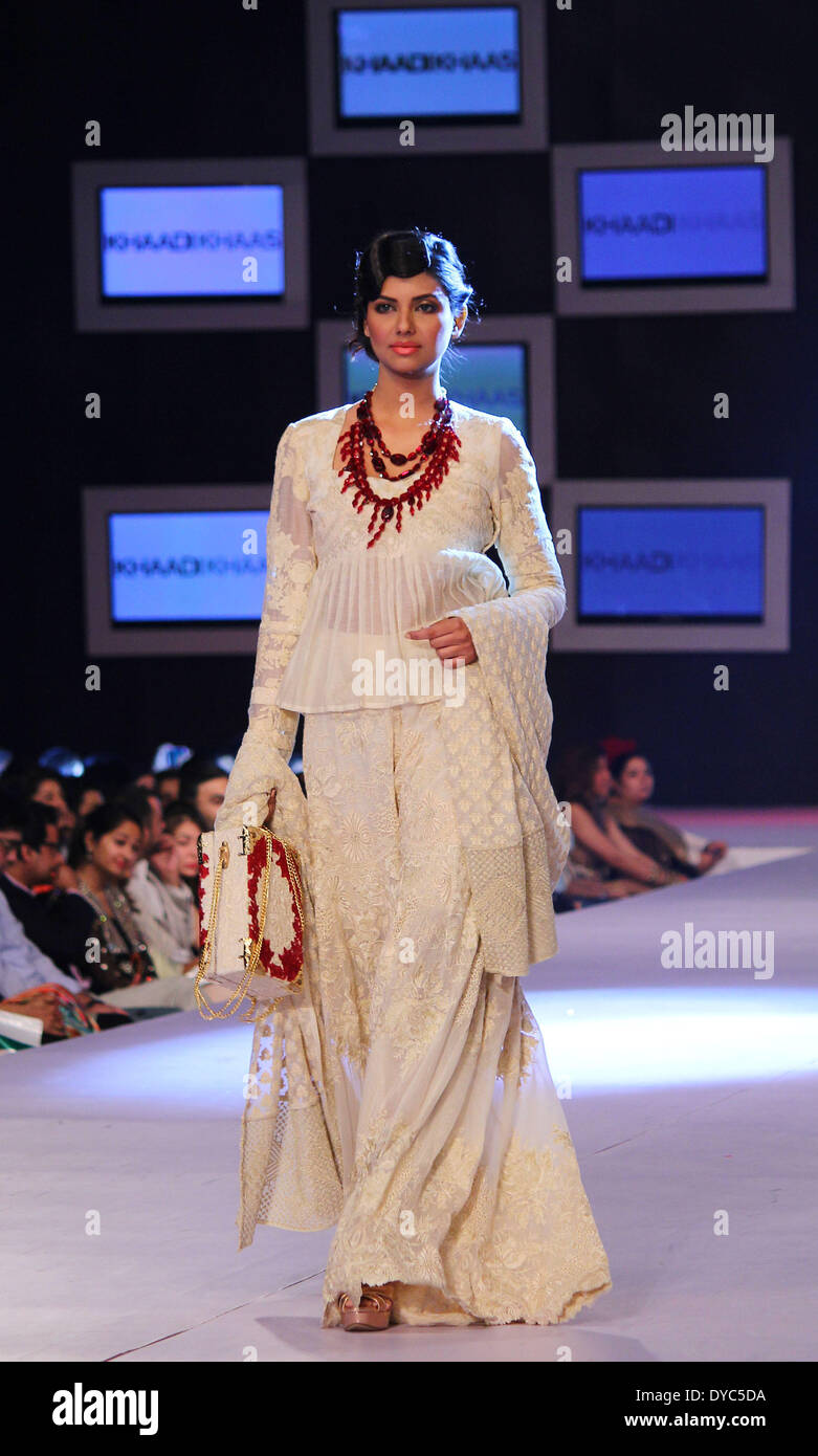LAHORE, PAKISTAN - APRIL 13 : Pakistani Models present creations by ...