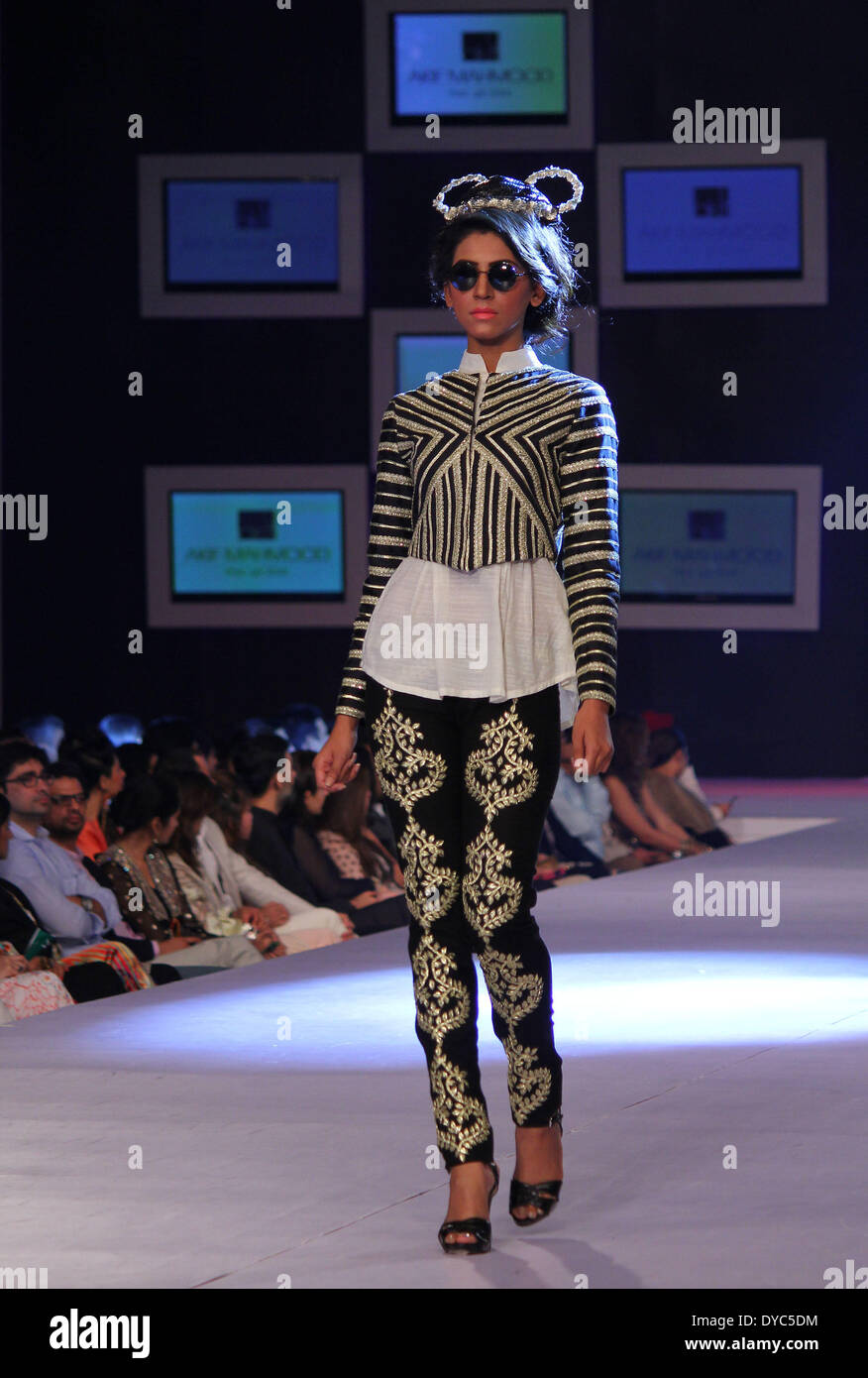 LAHORE, PAKISTAN - APRIL 13 : Pakistani Models present creations by ...