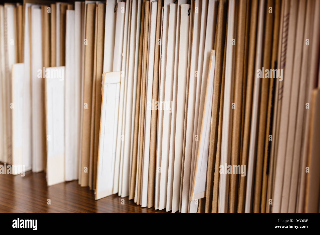 Keeping Records On Yellow Shelves Background Stock Photo - Alamy