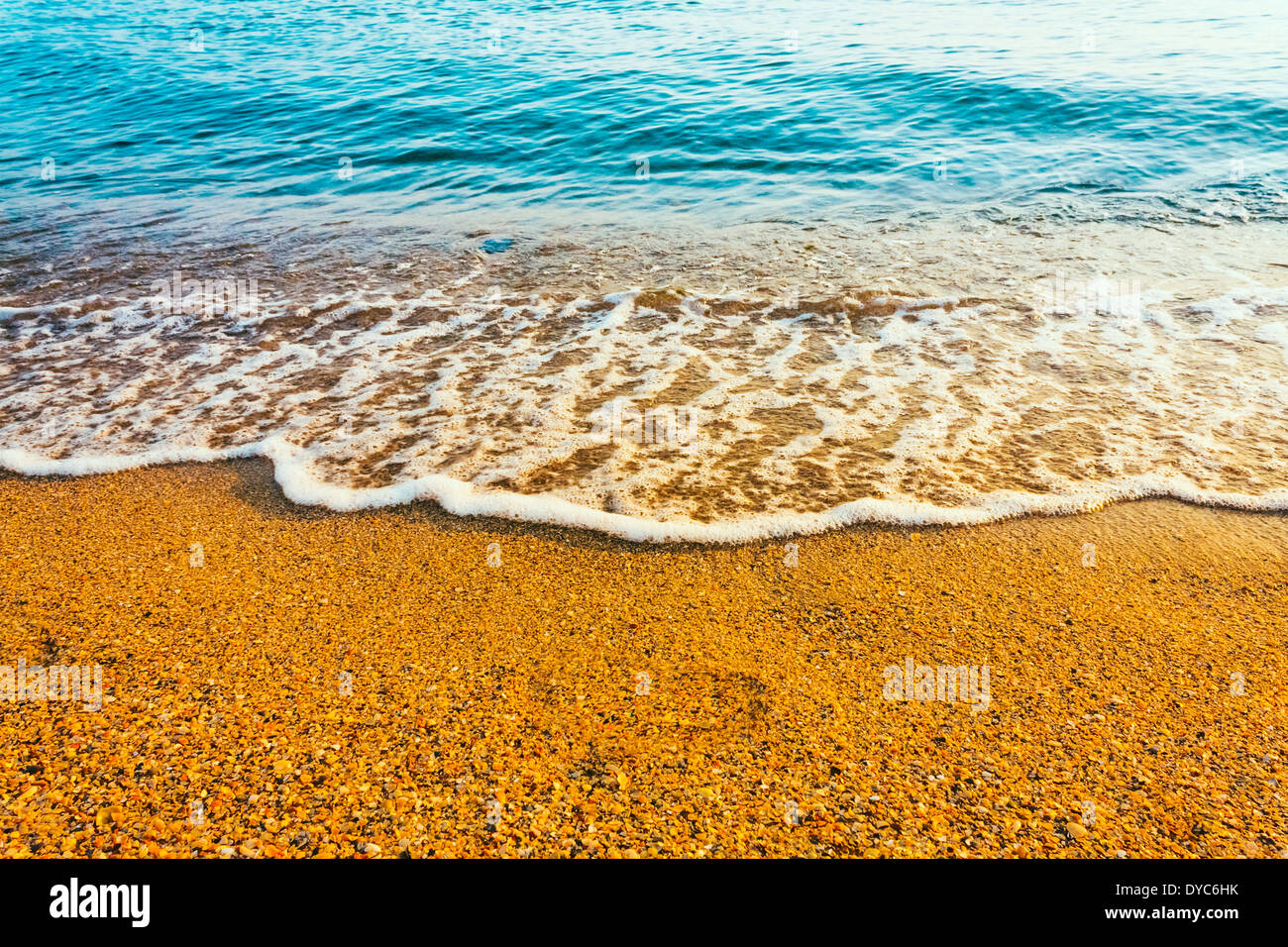 Soft Sea Ocean Waves Wash Over Golden Sand Background Stock Photo - Alamy