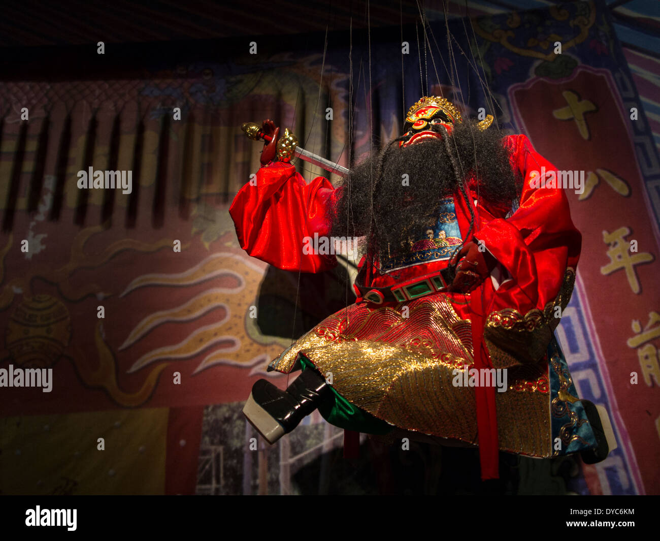 A Chinese marionette puppet hangs from the ceiling at the Puppetry Art ...