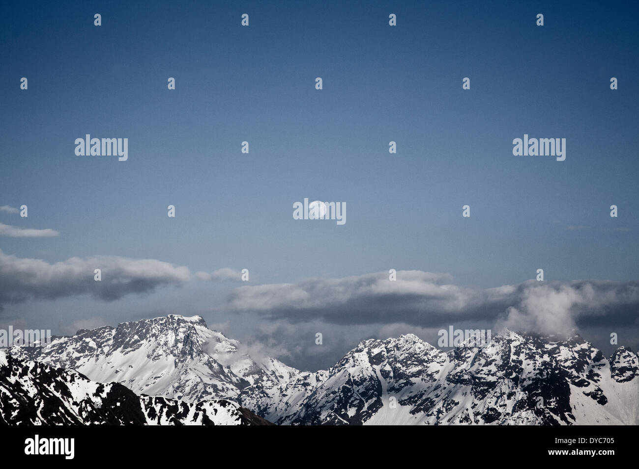 Full moon over snowy mountain hi-res stock photography and images - Alamy
