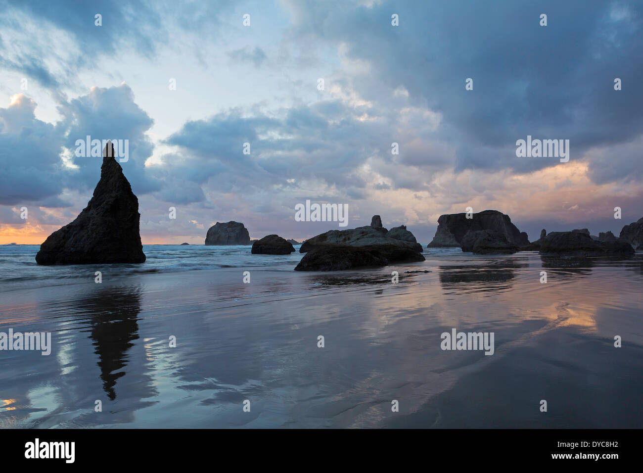 Tidepools and sea stacks, rocks, at sunset along Bandon Beach, Oregon ...