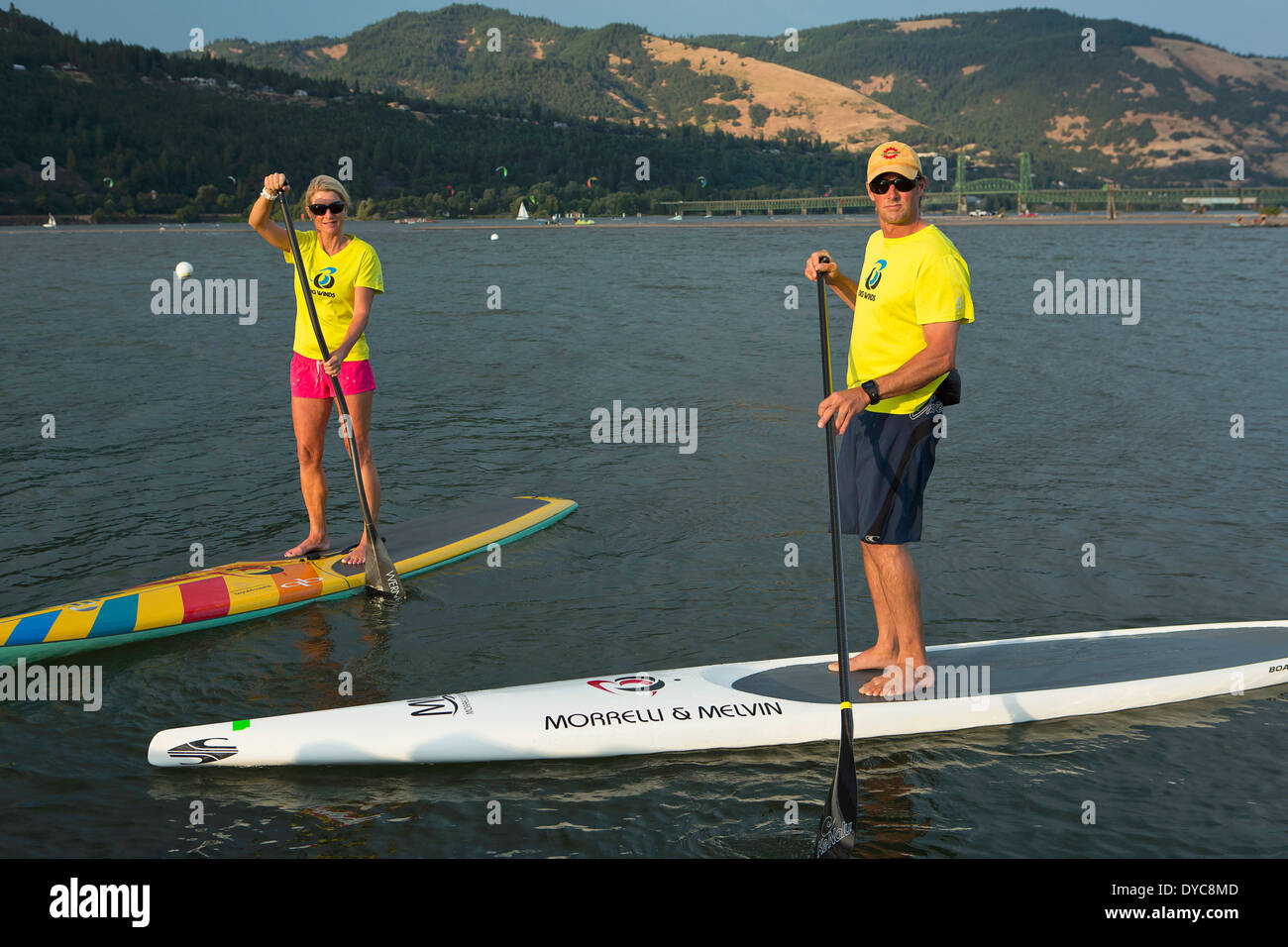 Model release yes. MacRae Wylde and Eva DeWolfe paddle boarding on the ...