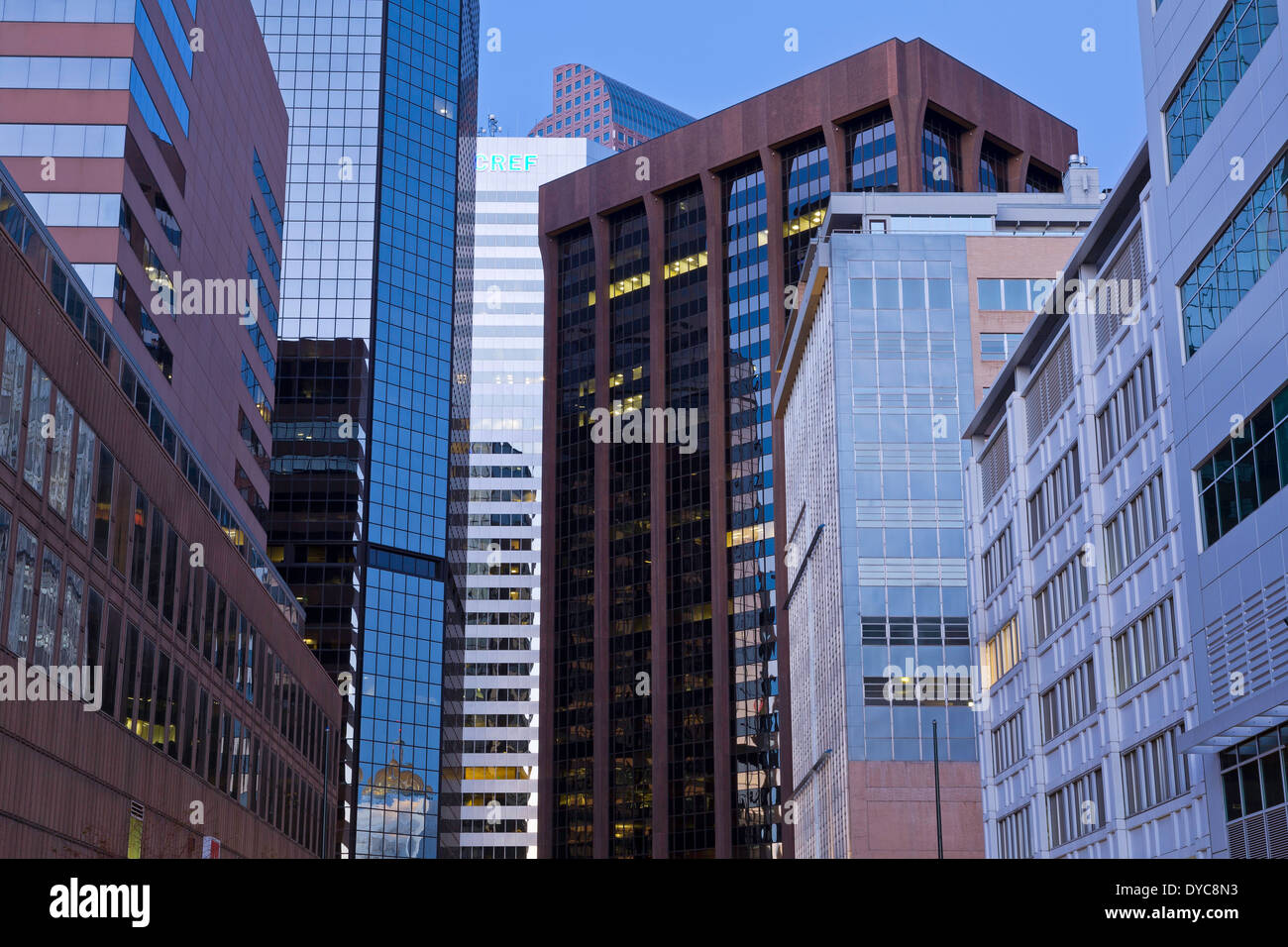 A perspective street view of downtown Denver at dusk. Denver, Colorado ...