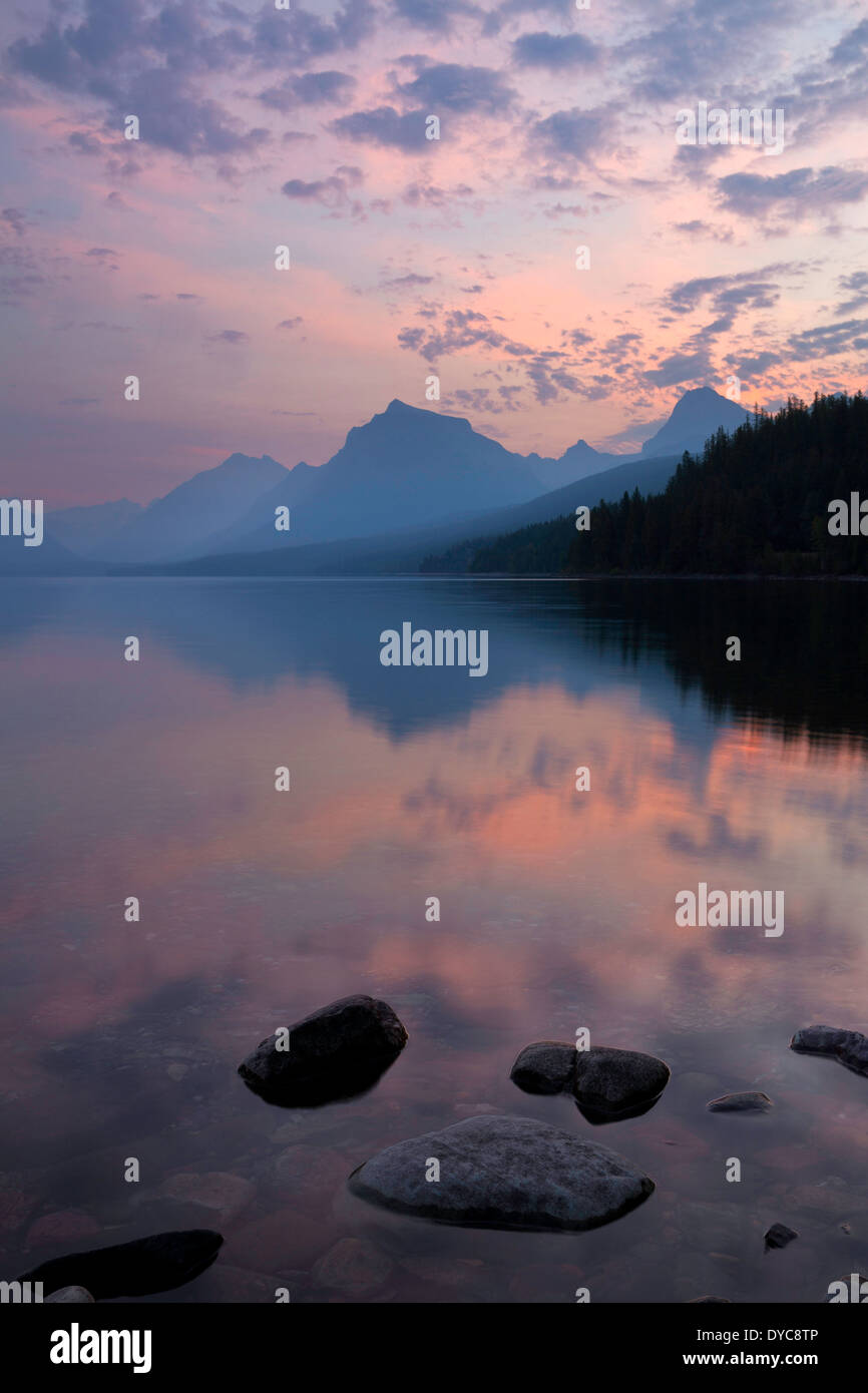 A fall sunrise over McDonald Lake in Glacier National Park, National ...