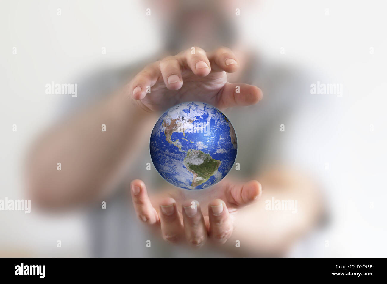 earth in hands Stock Photo - Alamy