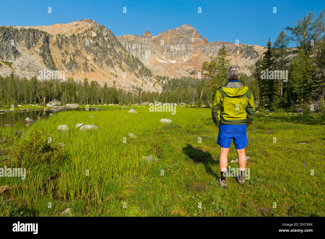 A hiker near Warren Peak and Warren Lake in the Anaconda Pintler ...