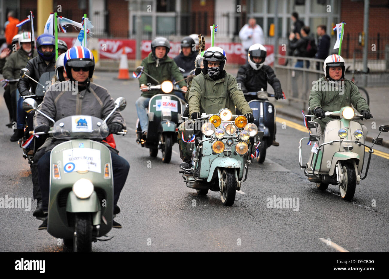 Group of Scooter enthusiasts ( Mods ) driving through Brighton UK Stock ...