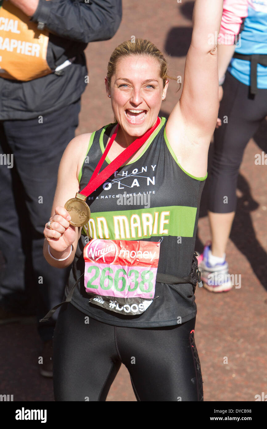 London,UK,13th April 2014,Ann Marie Robinson shows off her medal after ...