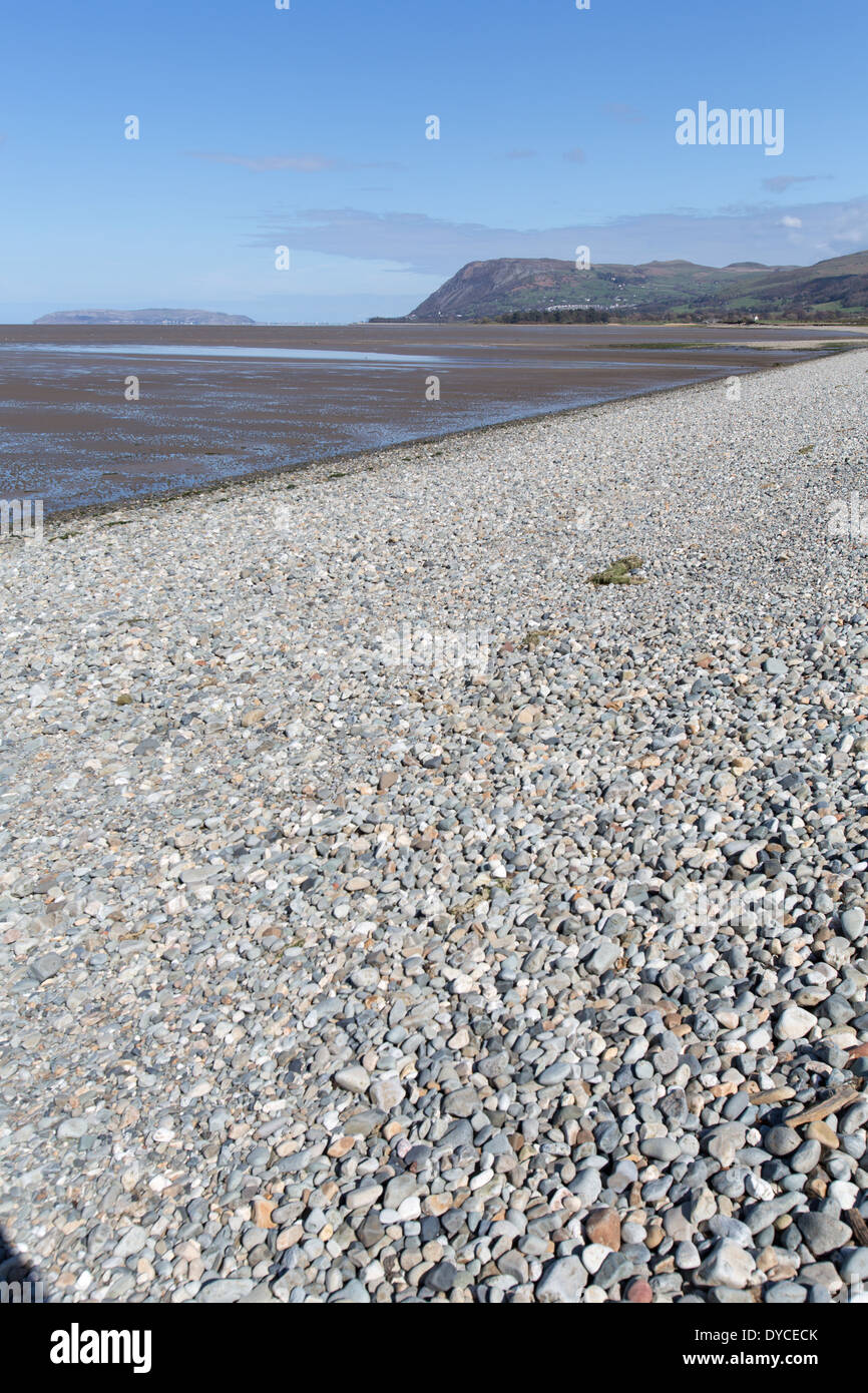 Pebble beach at Traeth Lafan Nature Reserve on the Wales Coast Path ...
