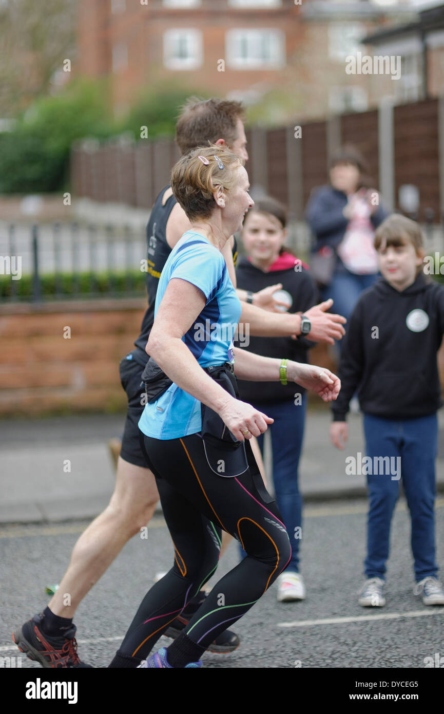 Runners reach the approximate half-way stage along Market Street ...