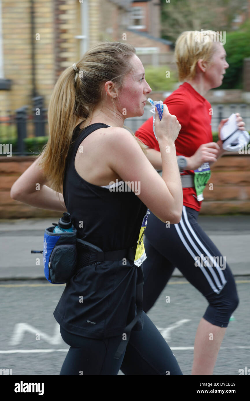 Runners reach the approximate half-way stage along Market Street ...