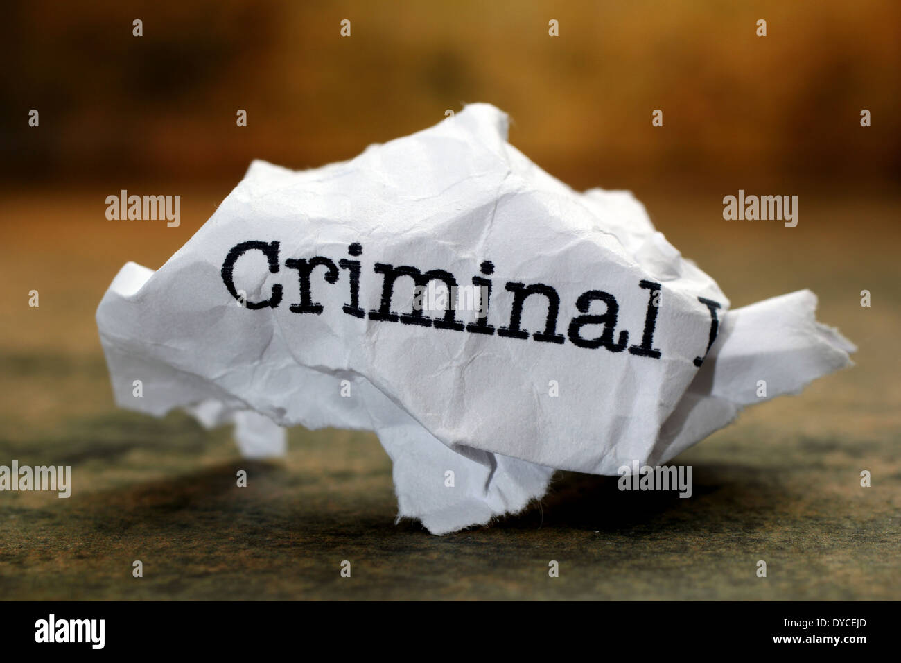 Criminal text on paper Stock Photo - Alamy
